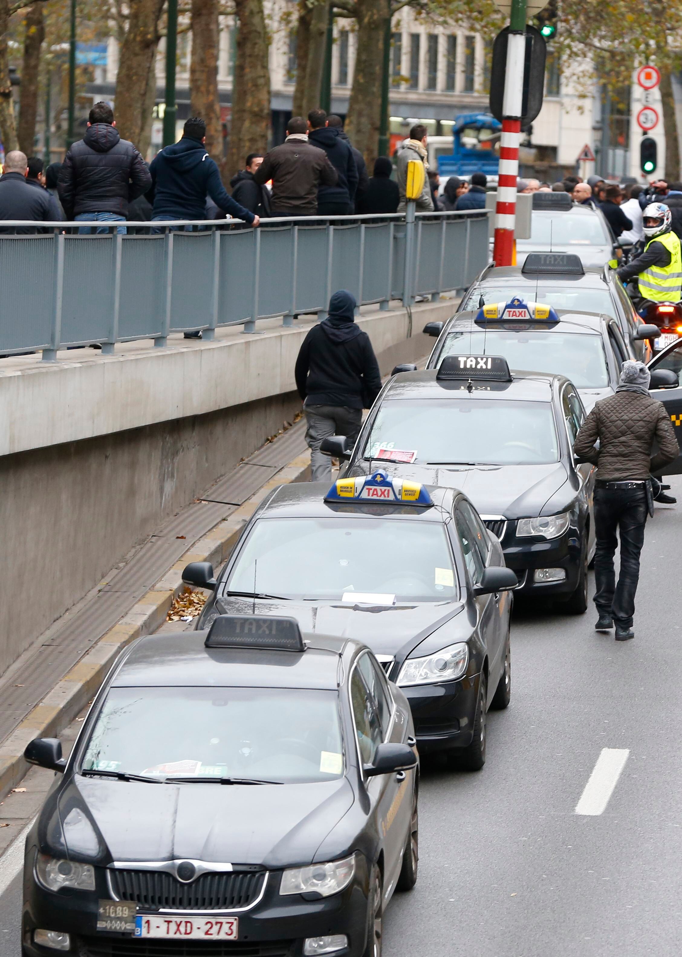 Verboden taxi-app leidt tot felle ruzie tussen Kroes en Belgische ... Verboden taxi-app leidt tot felle ruzie tussen Kroes en Belgische ...